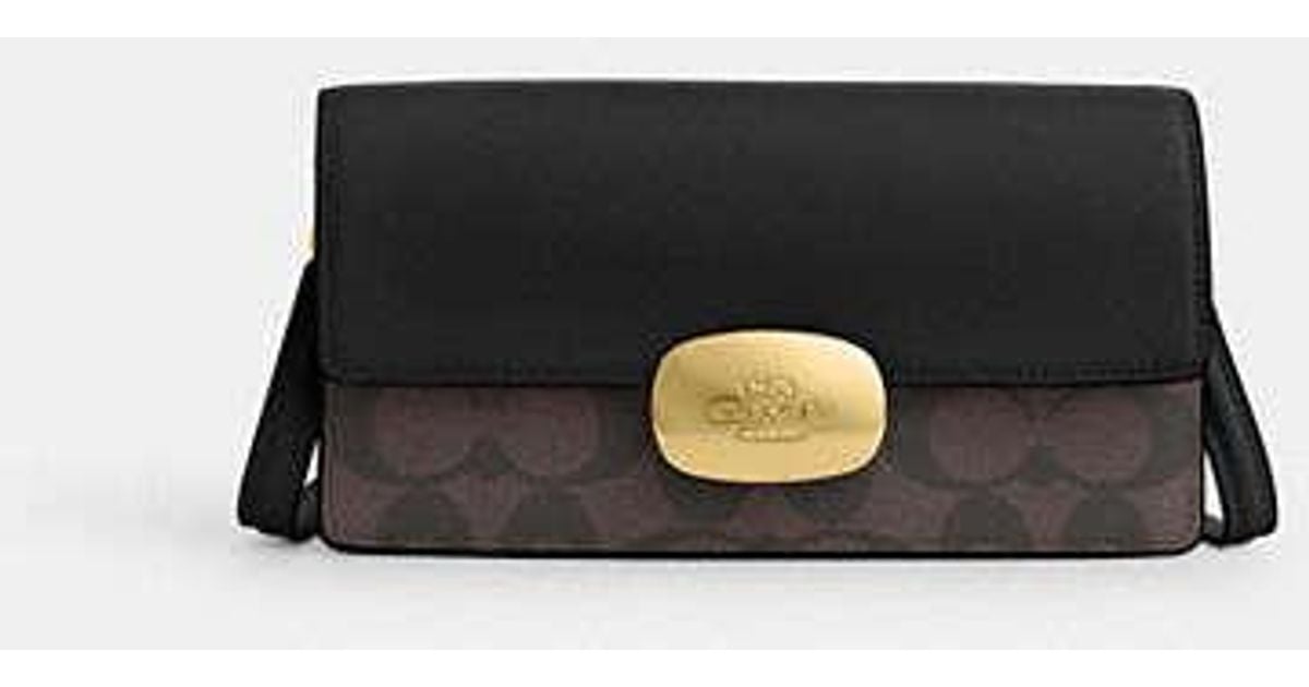 COACH Eliza Small Flap Crossbody in Black | Lyst