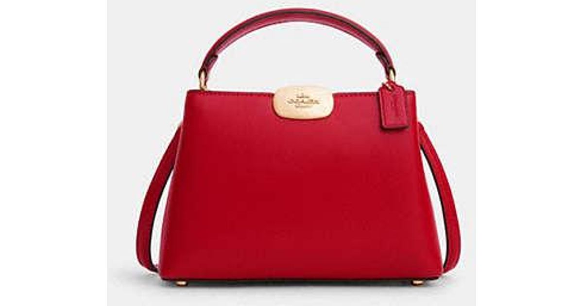 COACH Leather Mini Carryall Bag in Red | Lyst