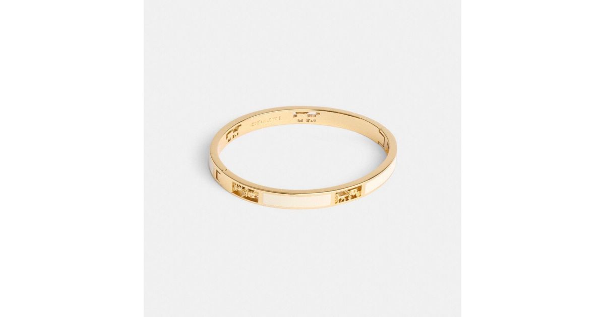 COACH Horse And Carriage Cut Out Enamel Bangle in Metallic | Lyst