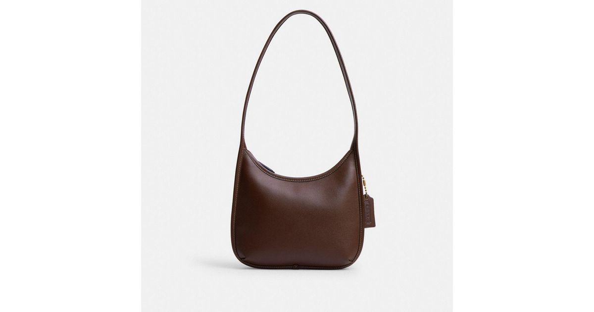 COACH Curve Zip Bag in Brown | Lyst