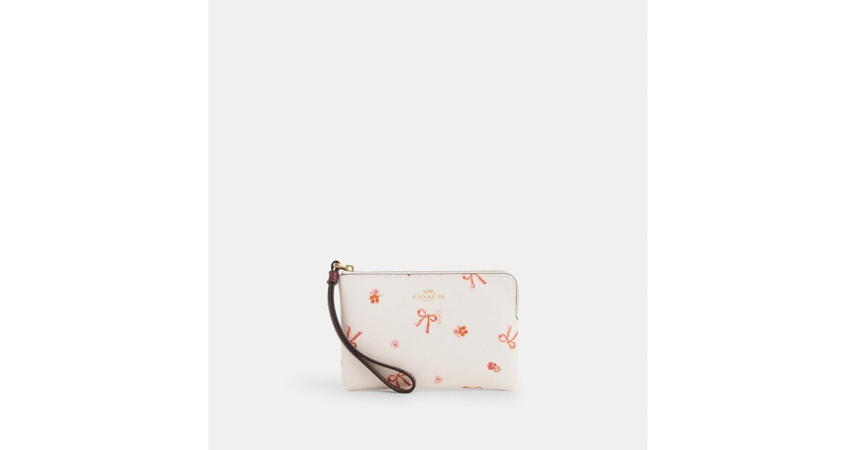 Coach Outlet Corner Zip Wristlet With Bow Print | Lyst