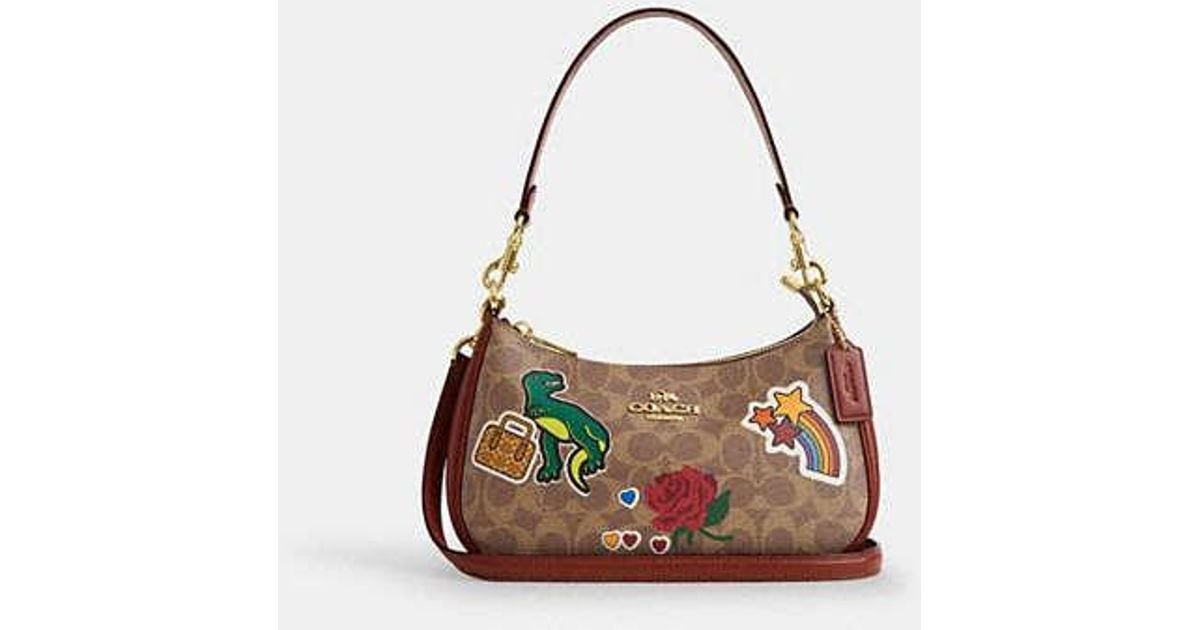 COACH Teri Shoulder Bag In Signature Canvas With Sticker Print in Black ...
