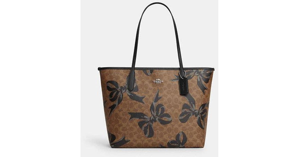 COACH City Tote Bag In Signature Canvas With Bow Print in Black | Lyst