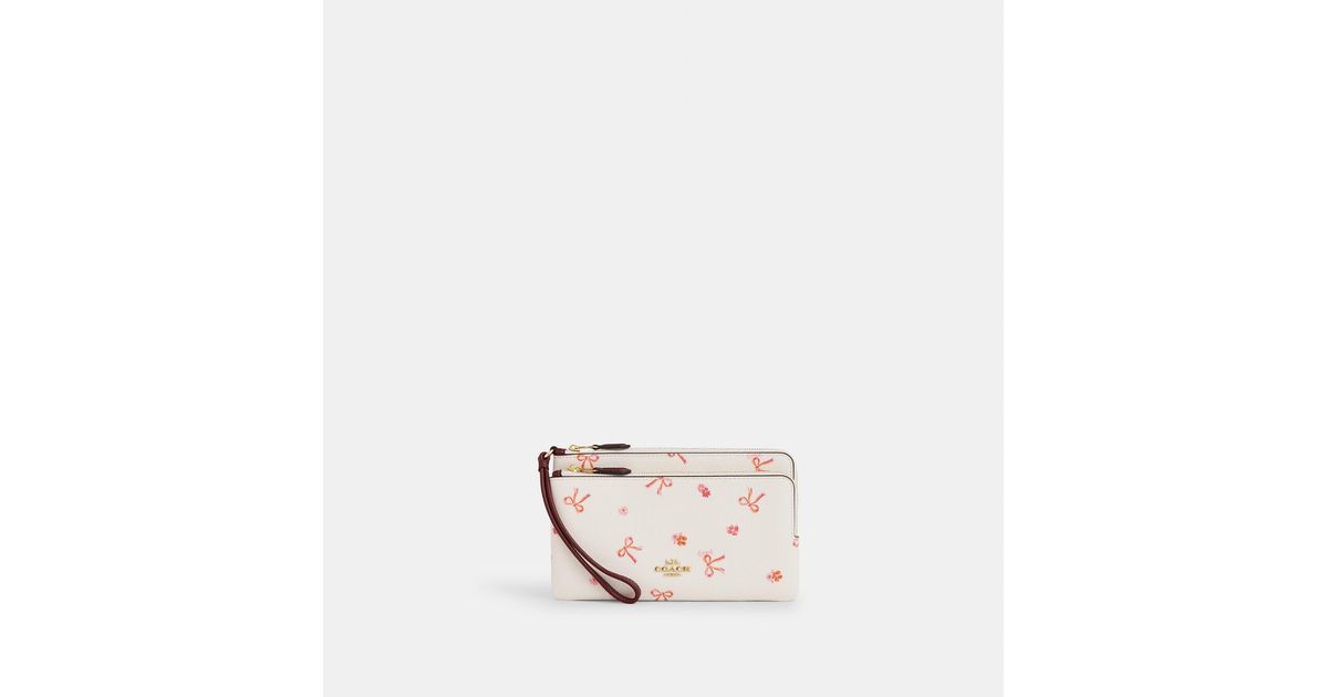 COACH Double Zip Wallet With Bow Print in White | Lyst