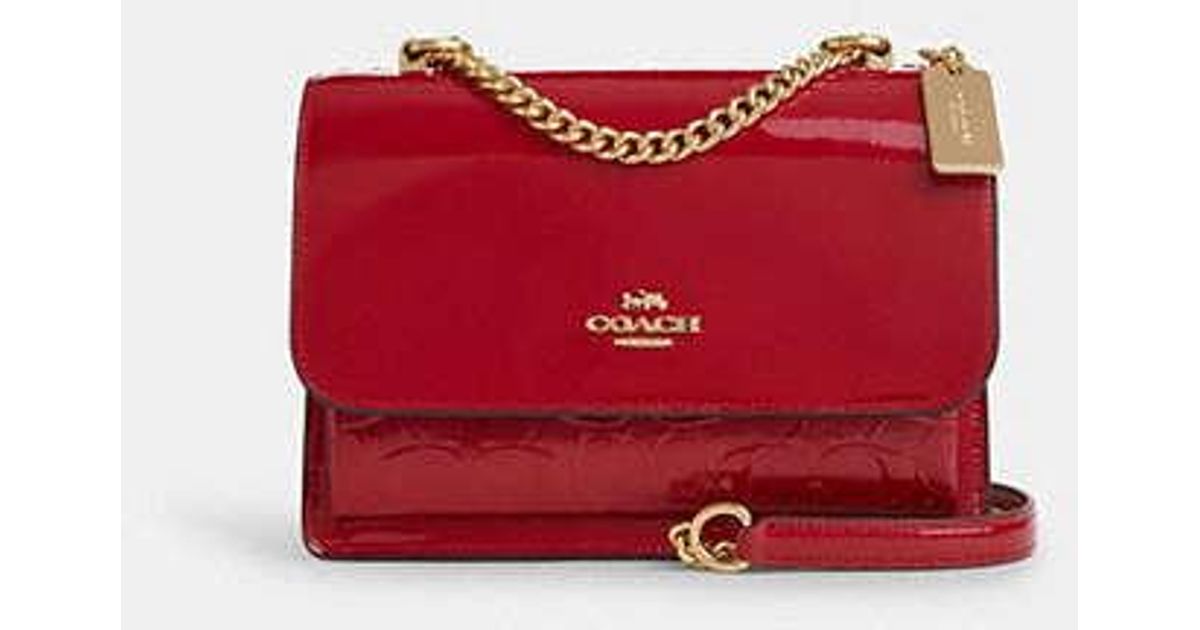 COACH Klare Crossbody Bag In Signature Leather in Red | Lyst