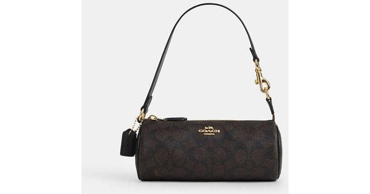 COACH Nolita Barrel Bag In Signature Canvas in Black | Lyst