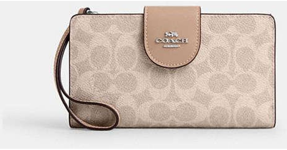 COACH Phone Wallet In Signature Canvas in Black | Lyst