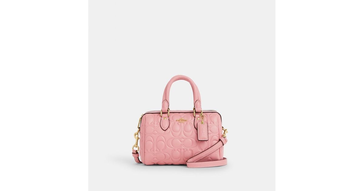 COACH Mini Rowan Crossbody With Signature in Pink | Lyst