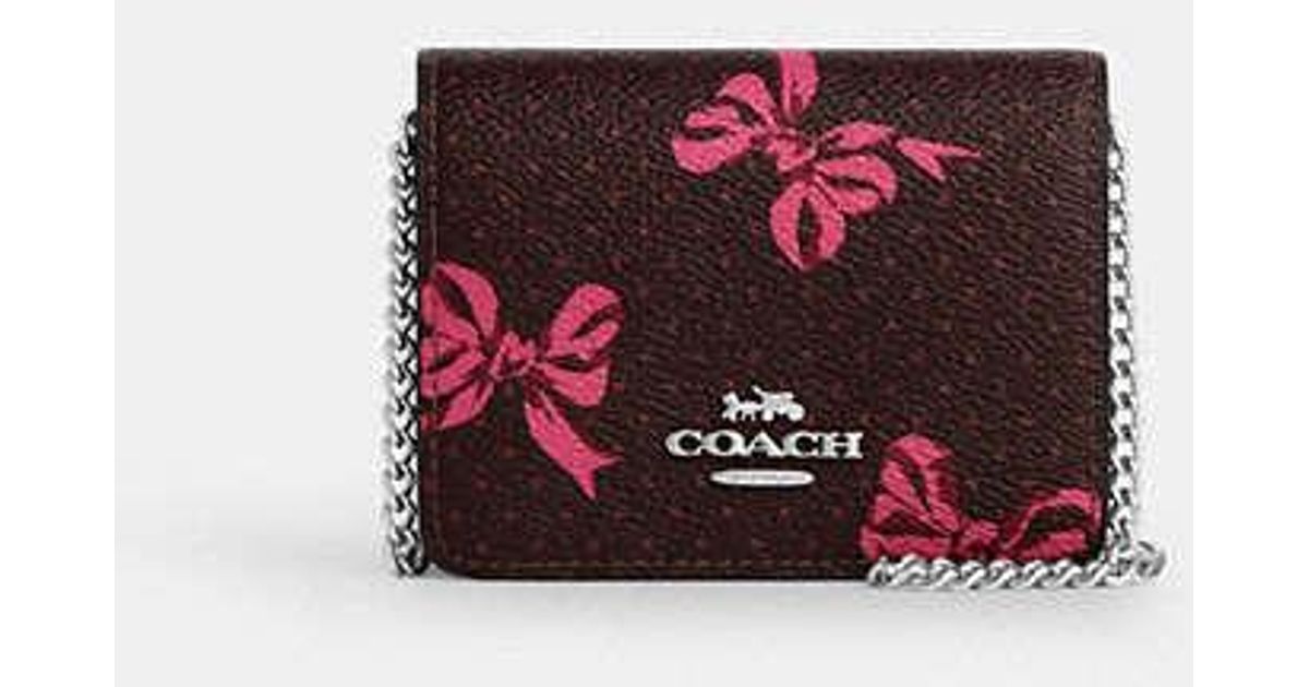COACH Mini Wallet On A Chain With Bow Print in Black | Lyst