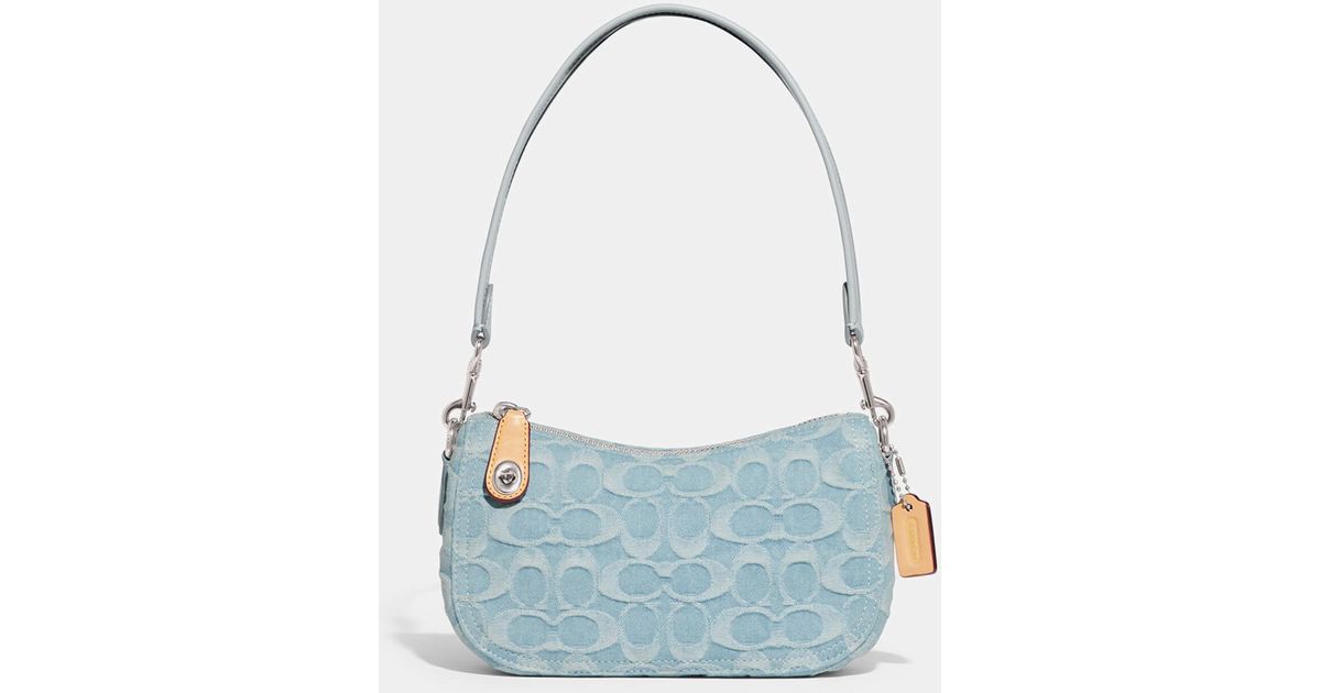 COACH Swinger 20 In Signature Denim in Blue | Lyst