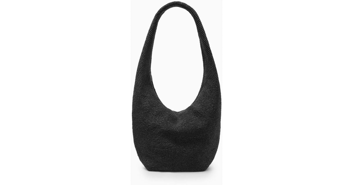COS Oversized Sling Bag - Raffia in Black | Lyst