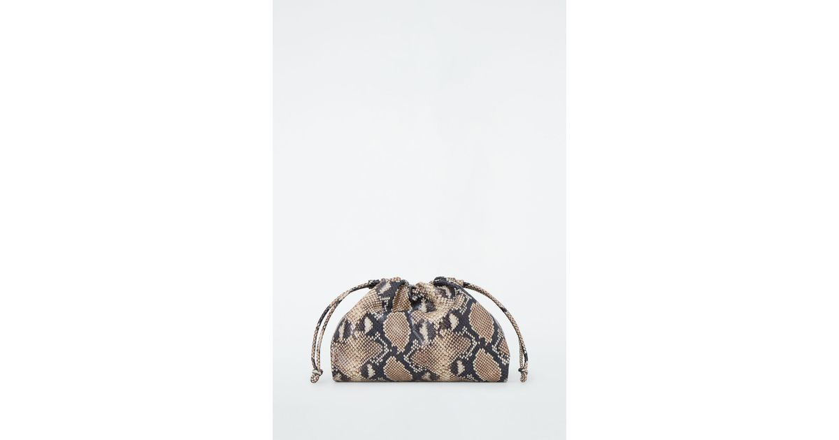 COS Mini Cavatelli Clutch - Leather in Natural | Lyst