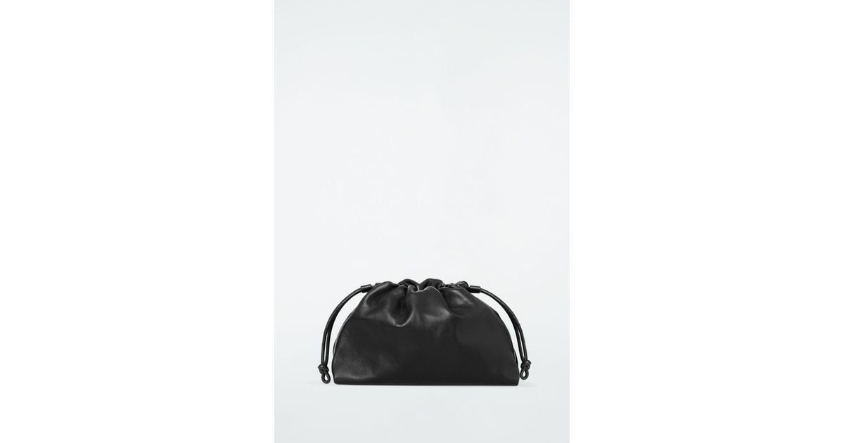 COS Mini Cavatelli Clutch Bag - Leather in Black | Lyst