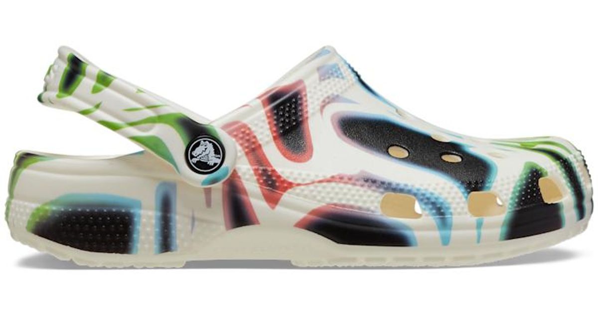 Crocs™ Classic Glow-In-The-Dark Swirl Clog; Multi in Black | Lyst