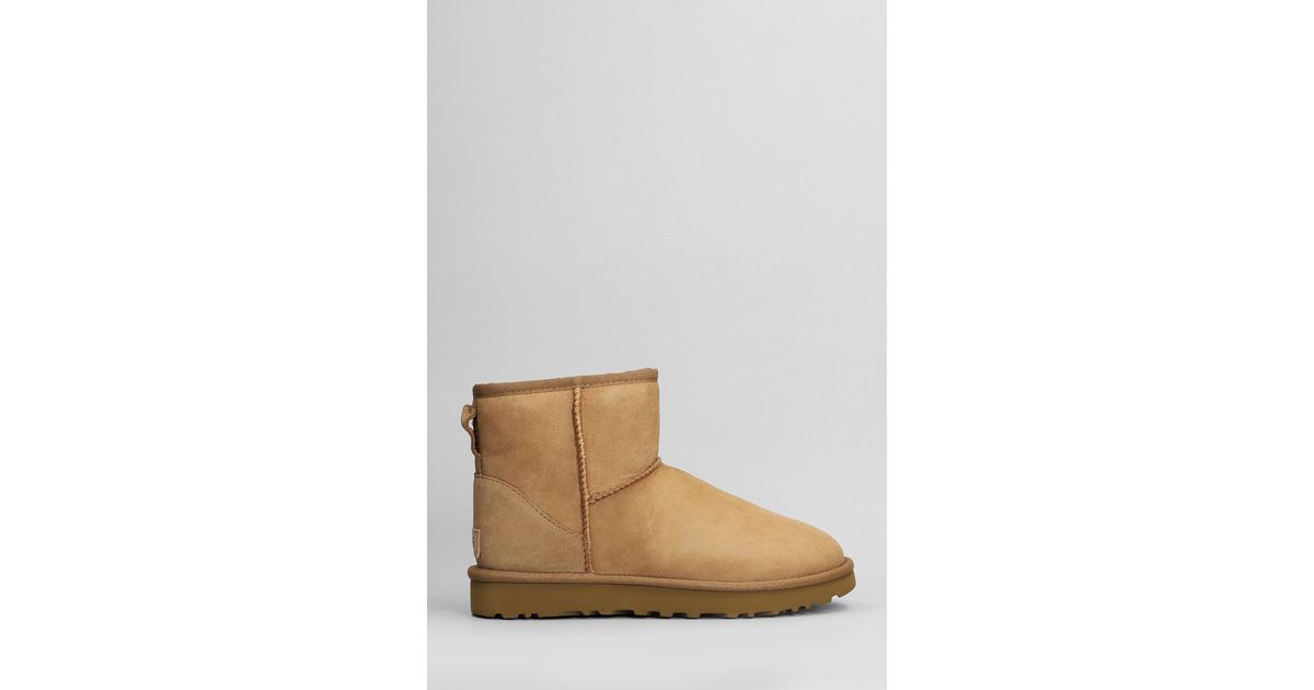 UGG Classic Mini Ii Low Heels Ankle Boots In Leather Color Suede in ...