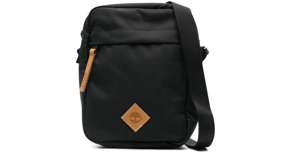 Timberland Logo-Patch Messenger Bag in Black for Men | Lyst