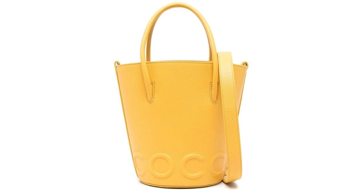 Coccinelle Handbags in Yellow | Lyst