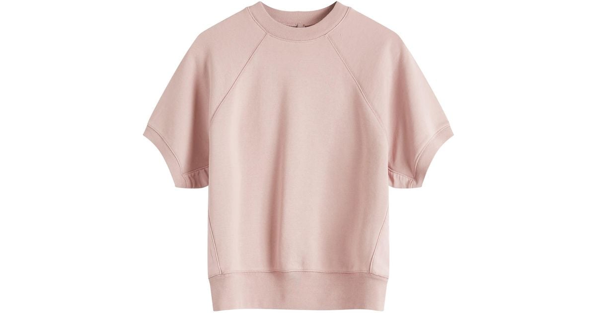 Skims Raglan Short Sleeve Sweatshirt in Pink | Lyst