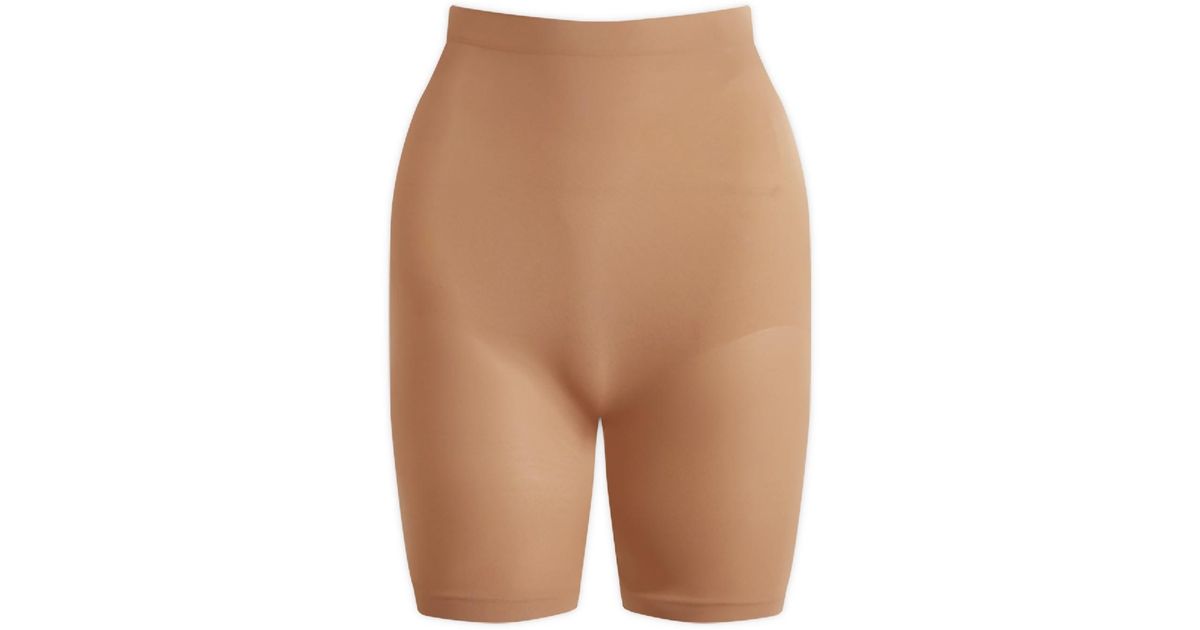 Skims Seamless Sculpt Mid Thigh Short in Natural | Lyst