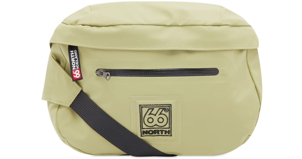 66 North Cross Body Bag in Green | Lyst