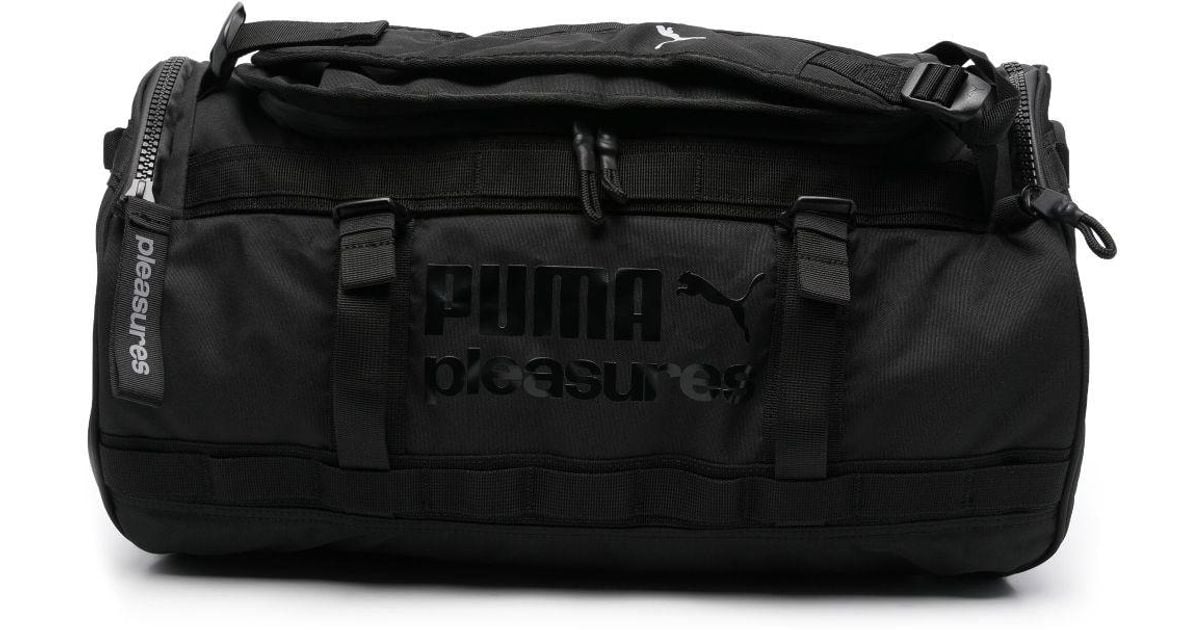 PUMA X Pleasures Duffle Bag in Black for Men | Lyst UK