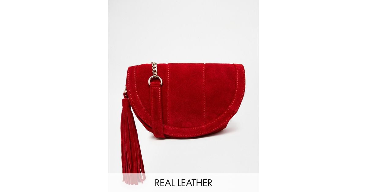 ASOS Suede Saddle Bag With Tassel in Red | Lyst