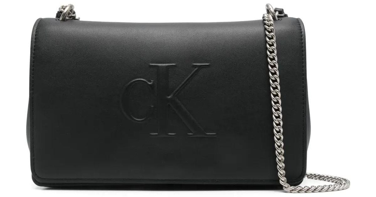 Calvin Klein Logo-Embossed Cross Body Bag in Black | Lyst