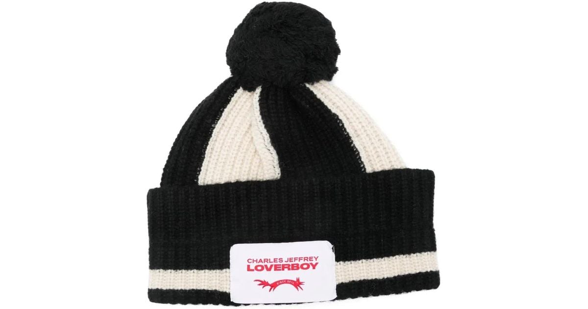 Charles Jeffrey Pompom Striped Beanie in Black | Lyst UK