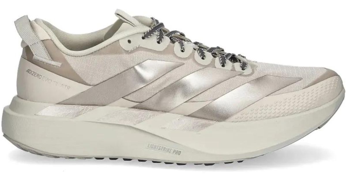 adidas Adizero Evo Sl Atr Striped Sneakers in White | Lyst UK