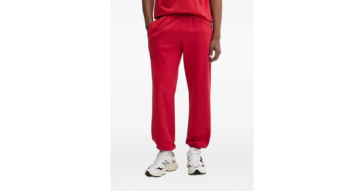 PANGAIA Logo-Print Cuffed Track Pants in Red | Lyst UK