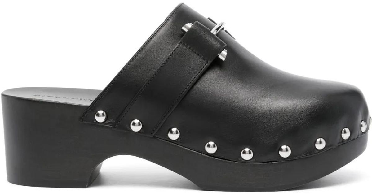 Givenchy 55Mm Logo-Engraved Leather Mules in Black | Lyst