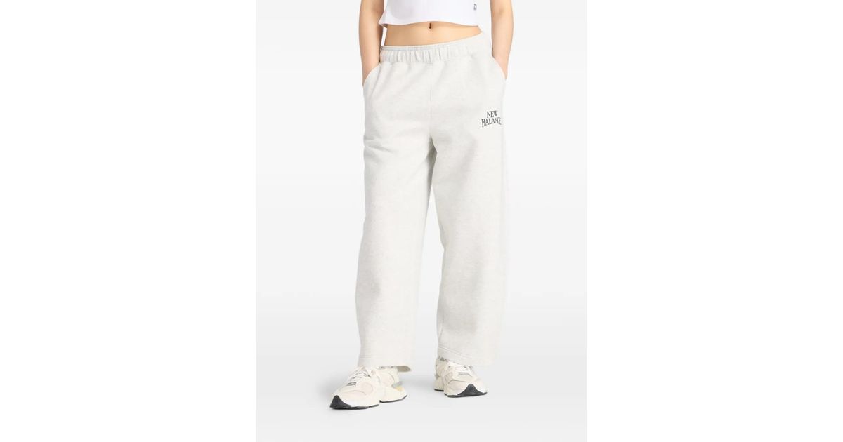 New Balance Barrel Fleece Graphic Track Pants in Natural | Lyst UK