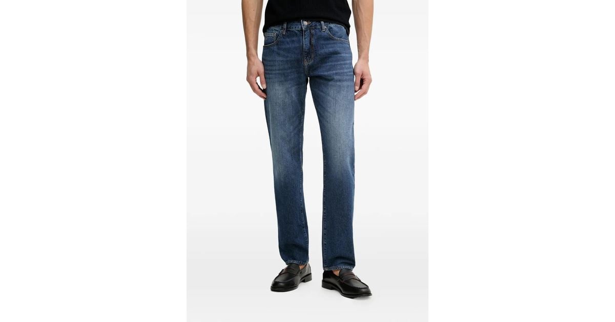 ARMANI EXCHANGE Logo-Embroidered Faded Jeans in Blue for Men | Lyst UK