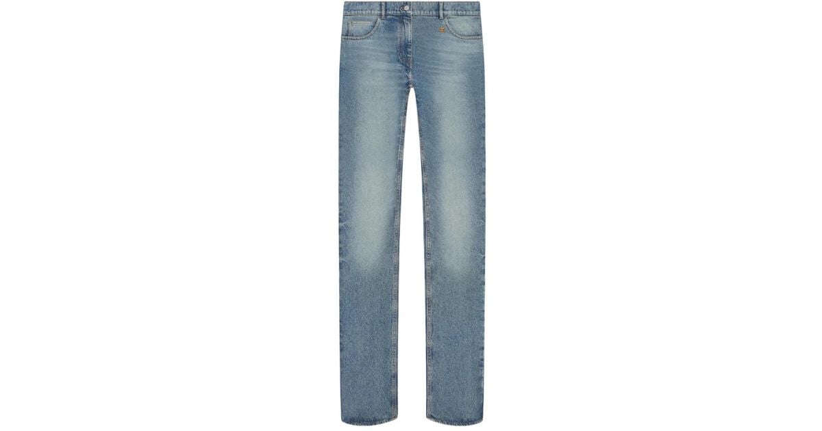 Courreges Logo Patch Jeans in Blue | Lyst UK