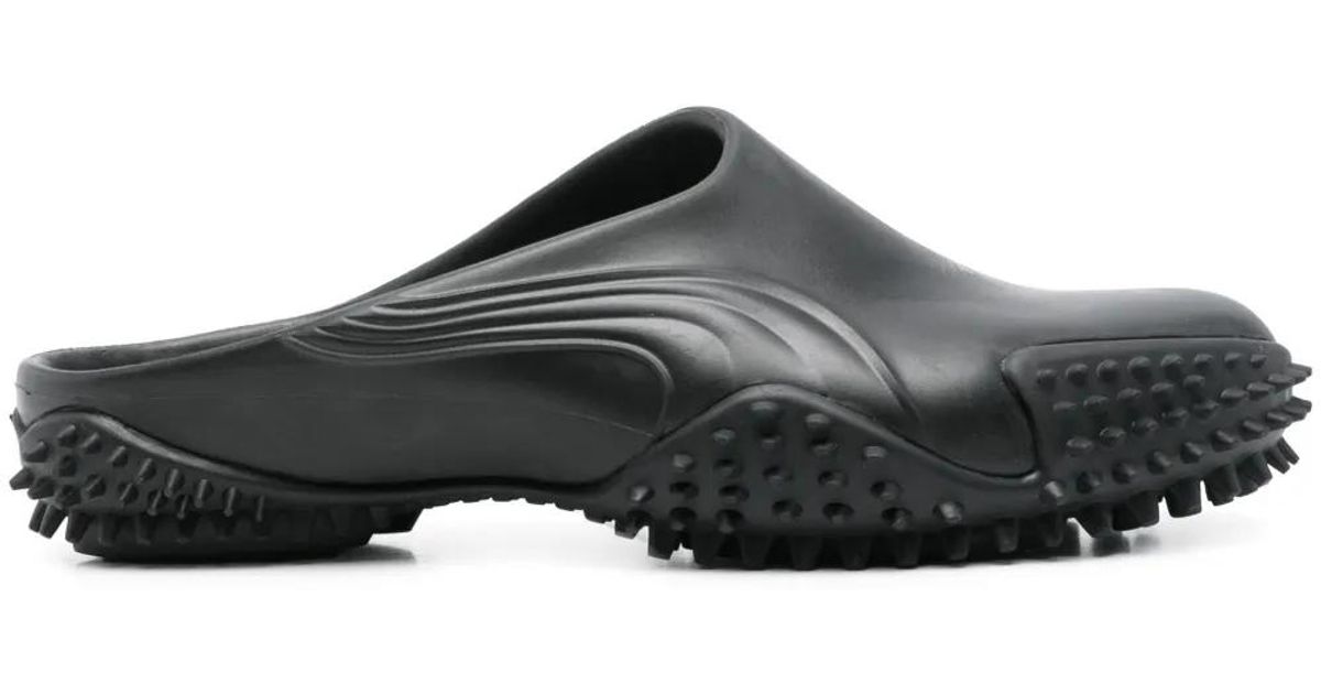 PUMA Mostro Slippers in Black for Men | Lyst