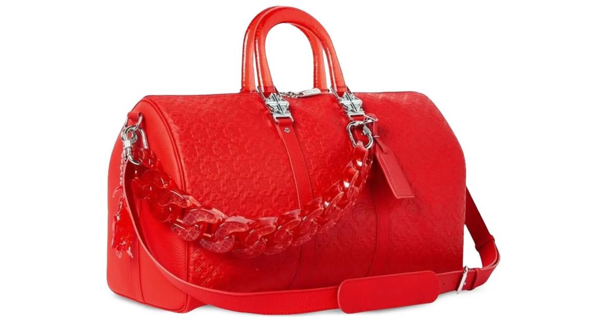 GUAPI Monogram Duffle Bag in Red | Lyst
