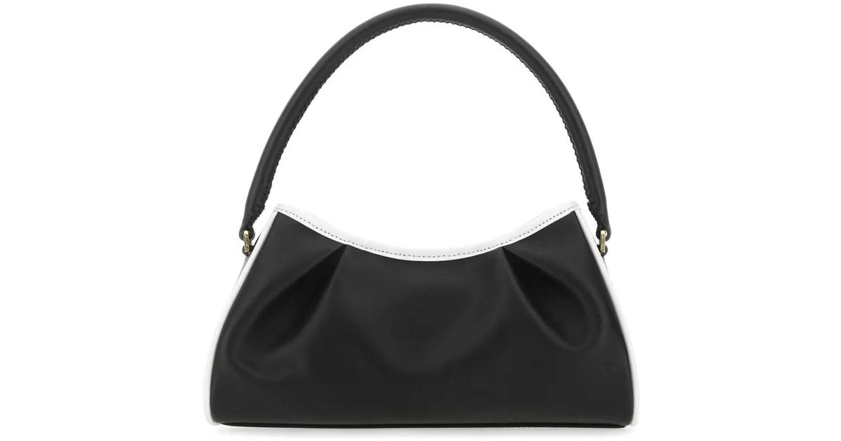 Elleme Dimple Moon Leather Shoulder Bag in Black | Lyst UK
