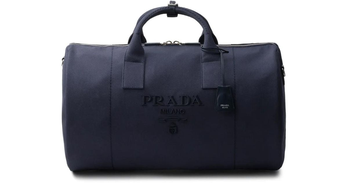 Prada Logo-Embossed Duffle Bag in Blue | Lyst