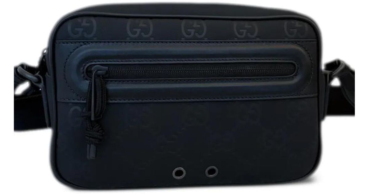 Gucci Monogram Embossed Messenger Bag in Black for Men | Lyst