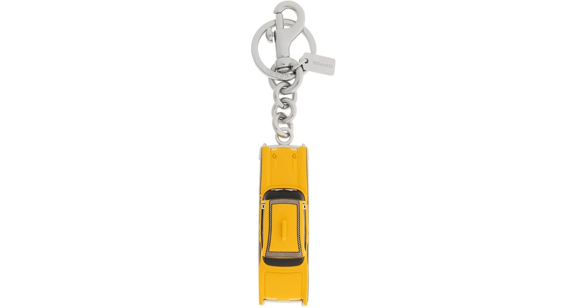COACH Small Taxi-Motif Bag Charm in White | Lyst