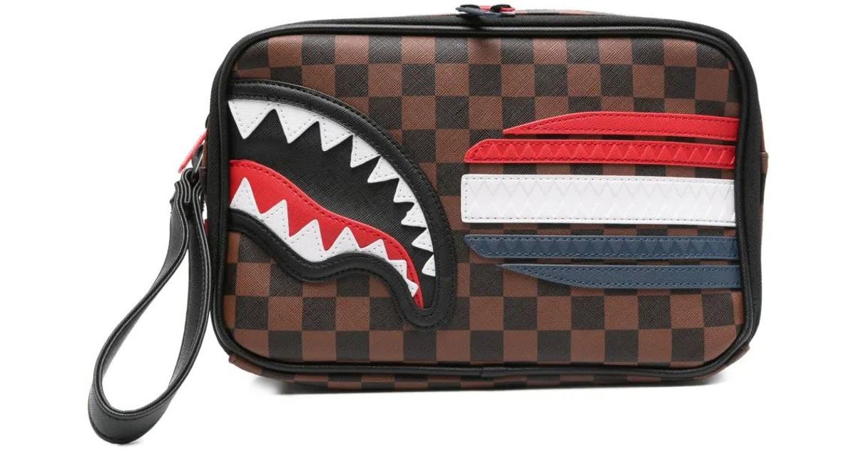 Sprayground Machine Francaise Clutch Bag in Black | Lyst Canada