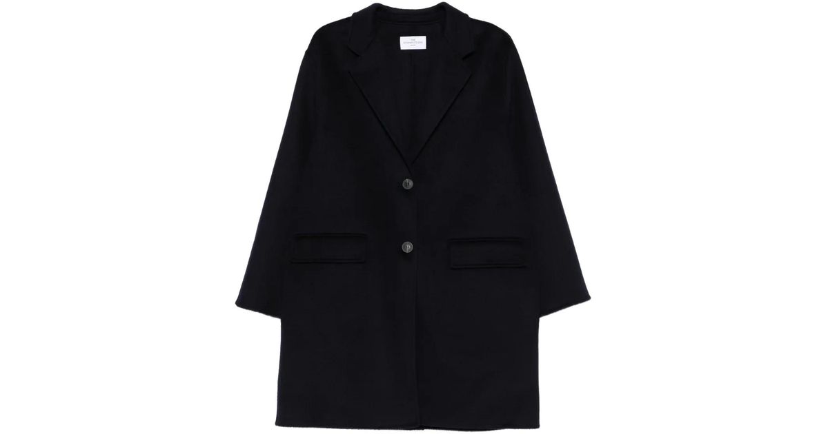The Dynamis Studio Button-Fastening Coat in Black | Lyst