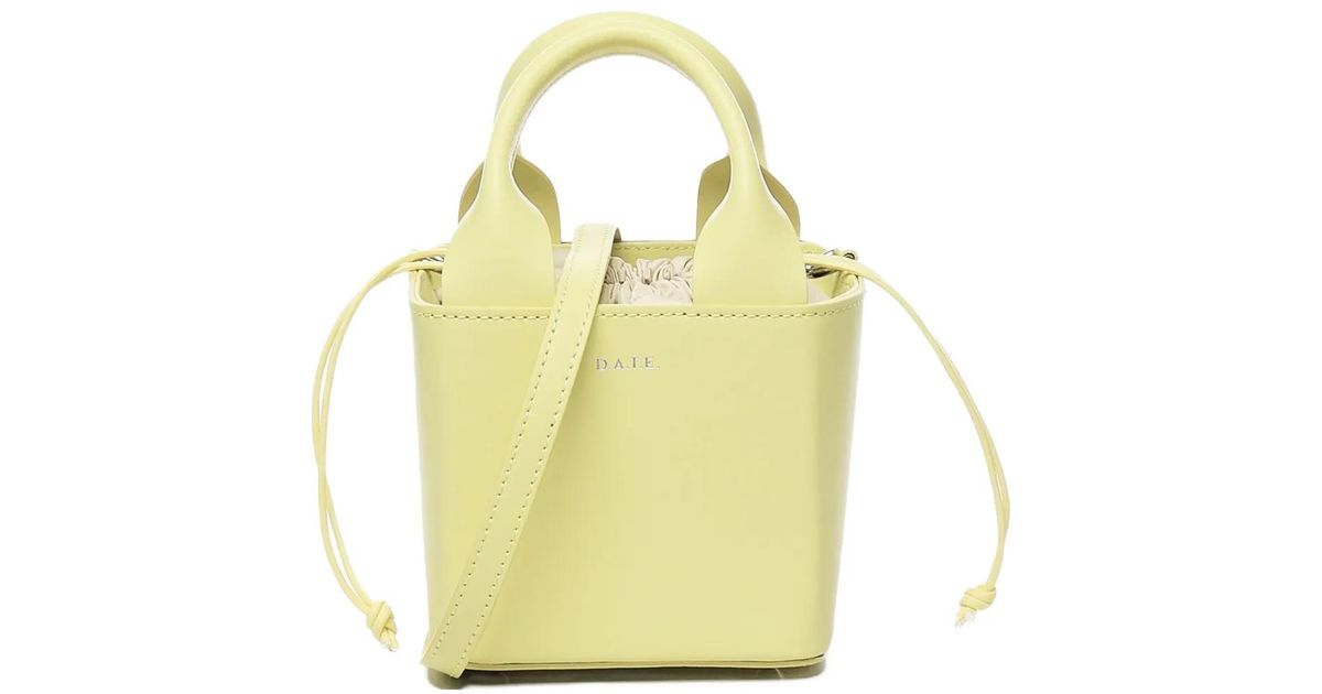 Date Cube Bucket Bag in Yellow | Lyst UK