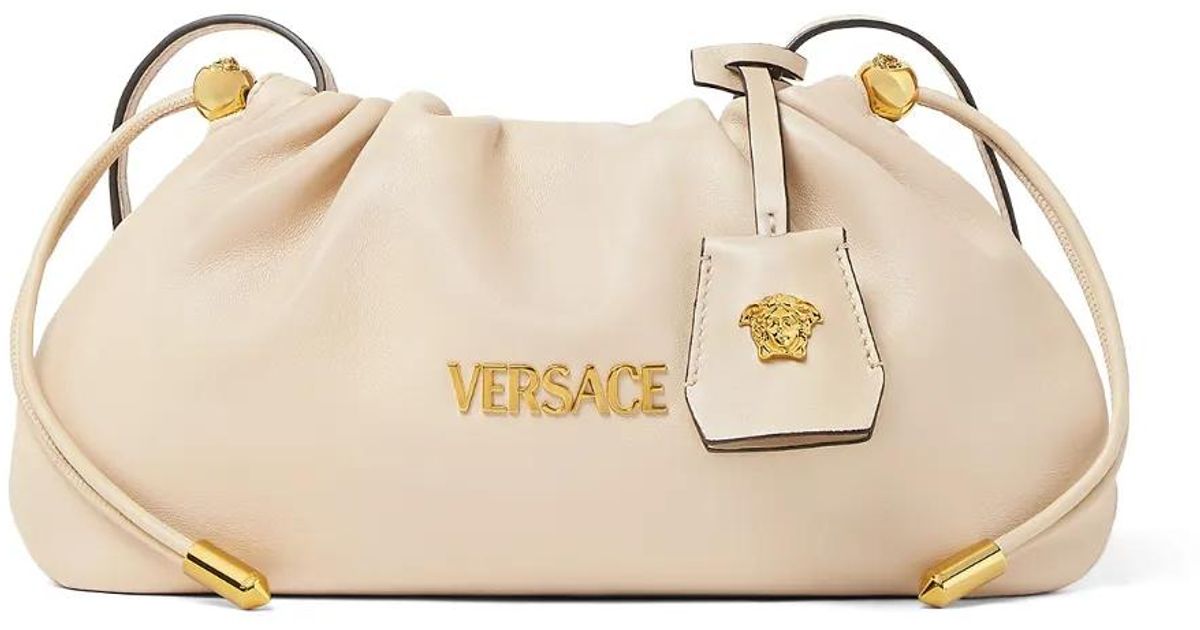 Versace Mini Tag Logo Clutch Bag in Natural | Lyst UK
