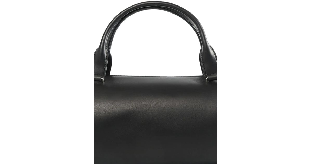 The Row Cylindrical Leather Bag in Black | Lyst