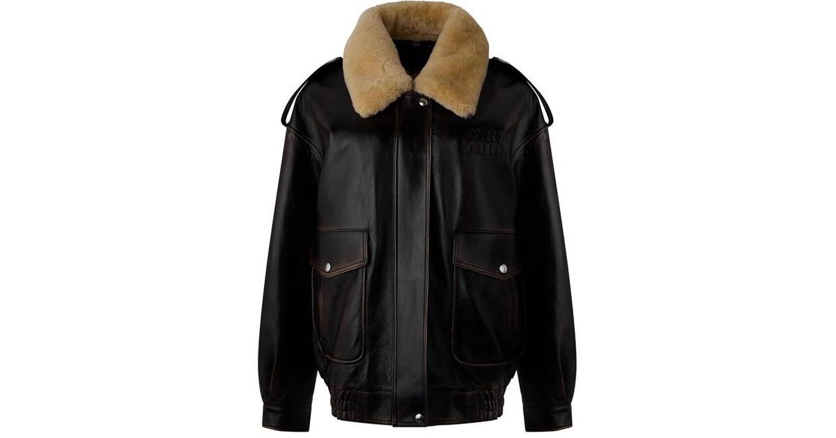 Miu Miu Faux Shearling And Nappa Logo Jacket in Black | Lyst UK