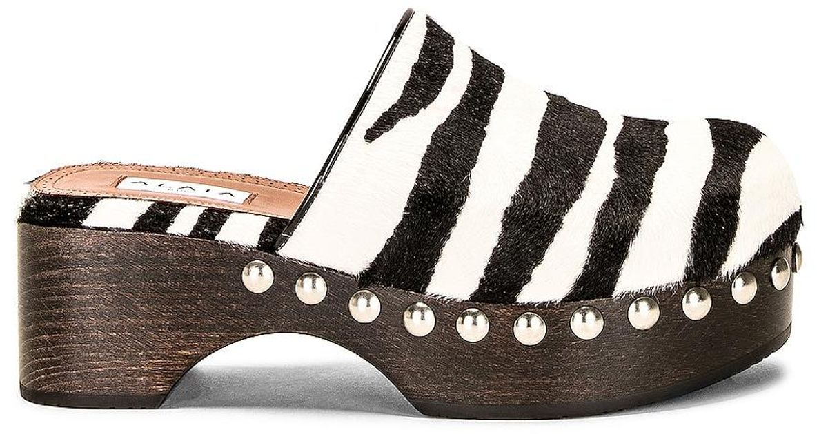 Alaïa Flat Clog in Black | Lyst