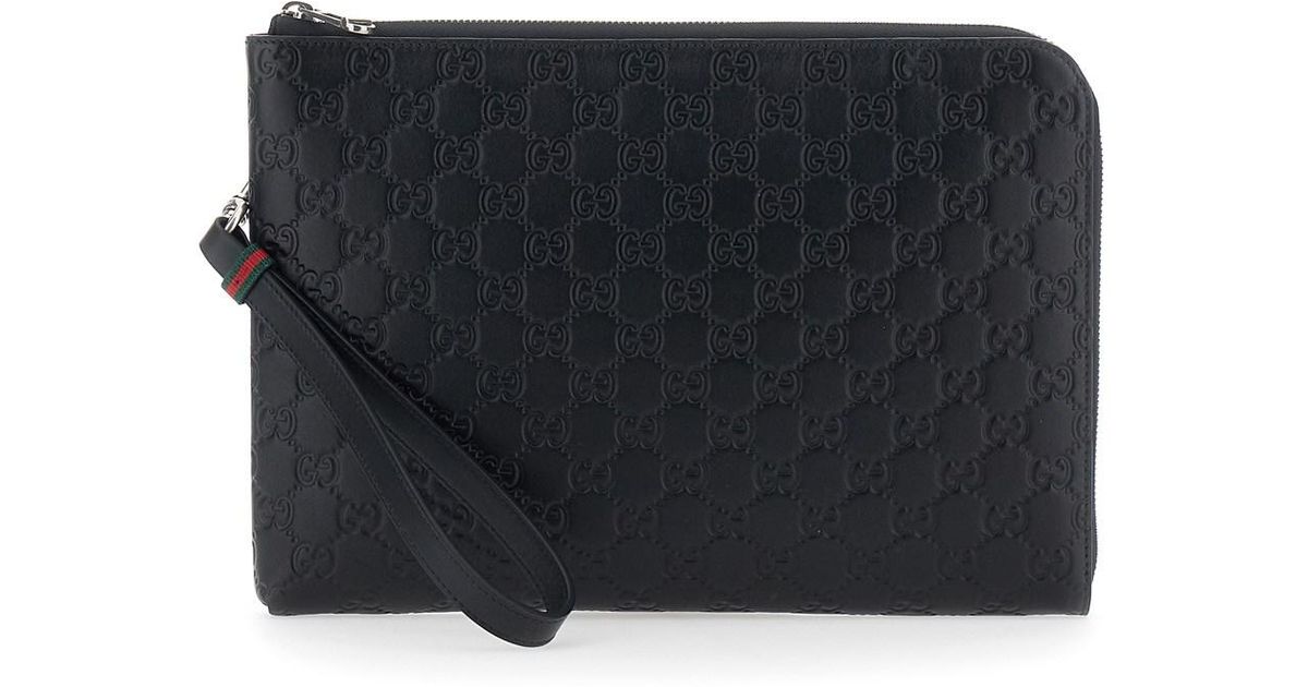 Gucci 'Emblem' Clutch Bag With All-Over Embossed Gg Logo in Black for ...