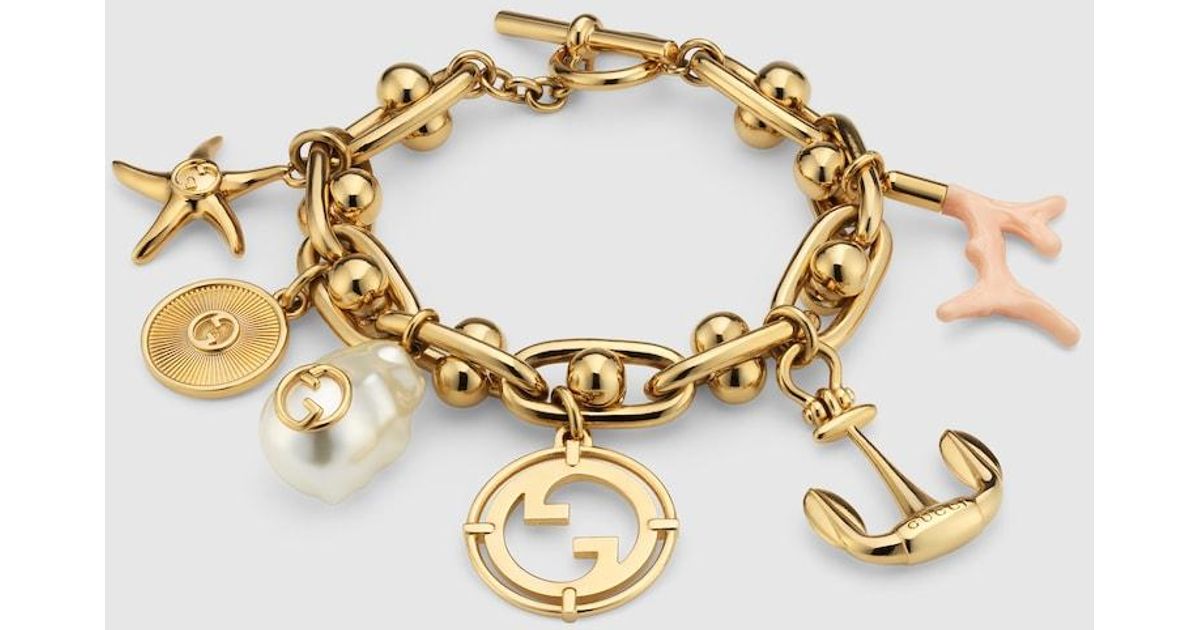 Gucci Chain Bracelet With Symbols in Metallic | Lyst