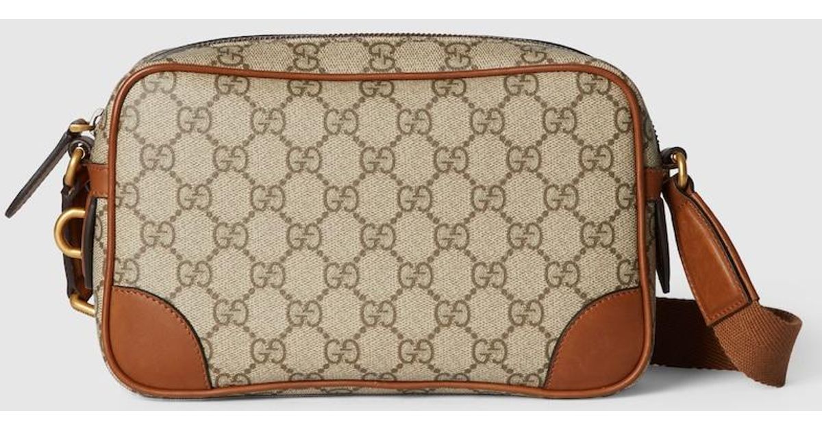 Gucci Gg Emblem Embossed Super Mini Bag in Brown for Men | Lyst